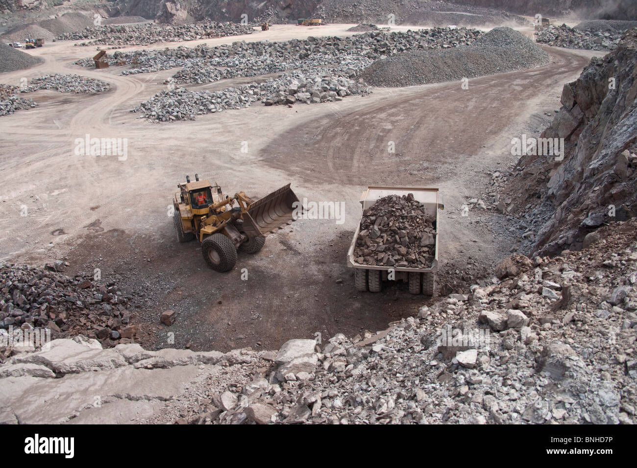 Large wheel dozer in open cast mine Stock Photo - Alamy
