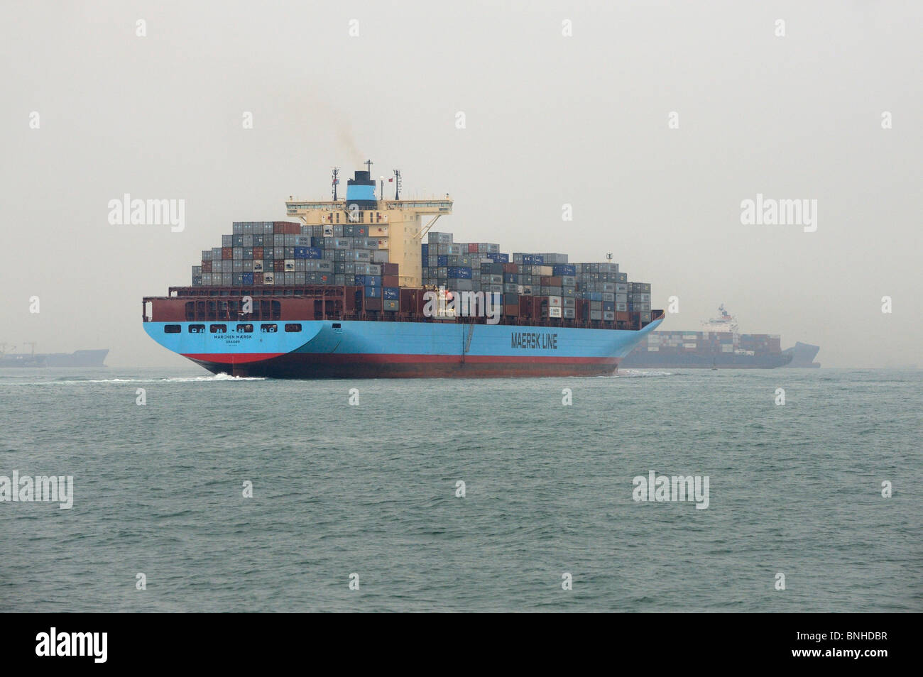 Hong Kong, Container ship from Maersk moving through the Lamma Channel ...