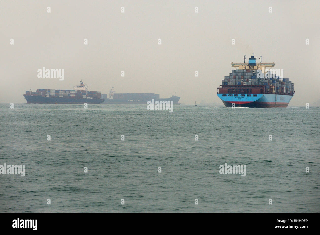 Hong Kong, Container ship from Maersk moving through the Lamma Channel ...