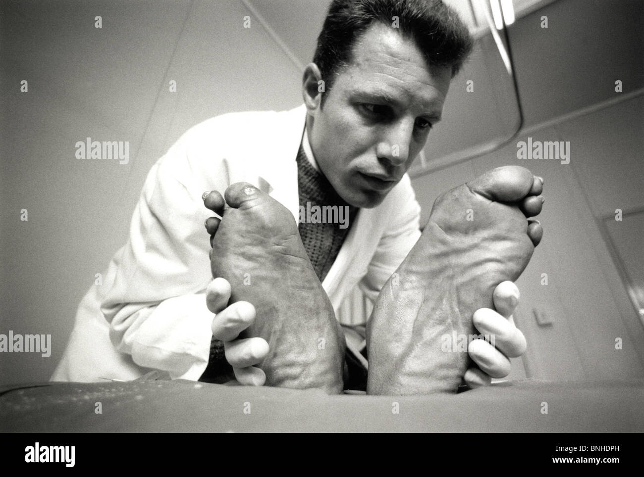 Podiatrist Examining Foot Patient High Resolution Stock Photography and ...