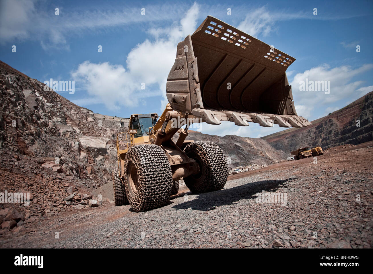 Large wheel dozer in open cast mine Stock Photo - Alamy