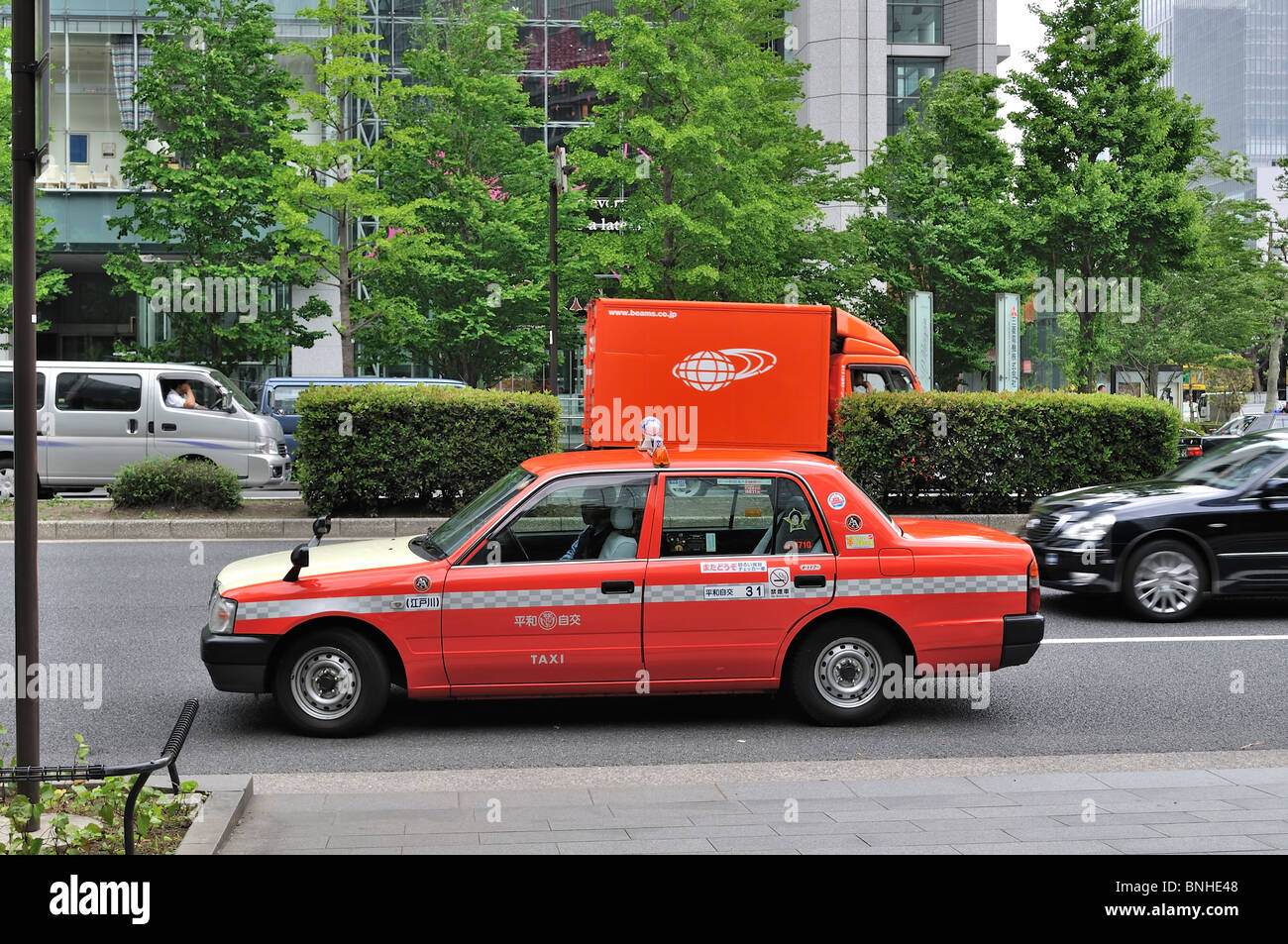Orange taxi japan hi-res stock photography and images - Alamy