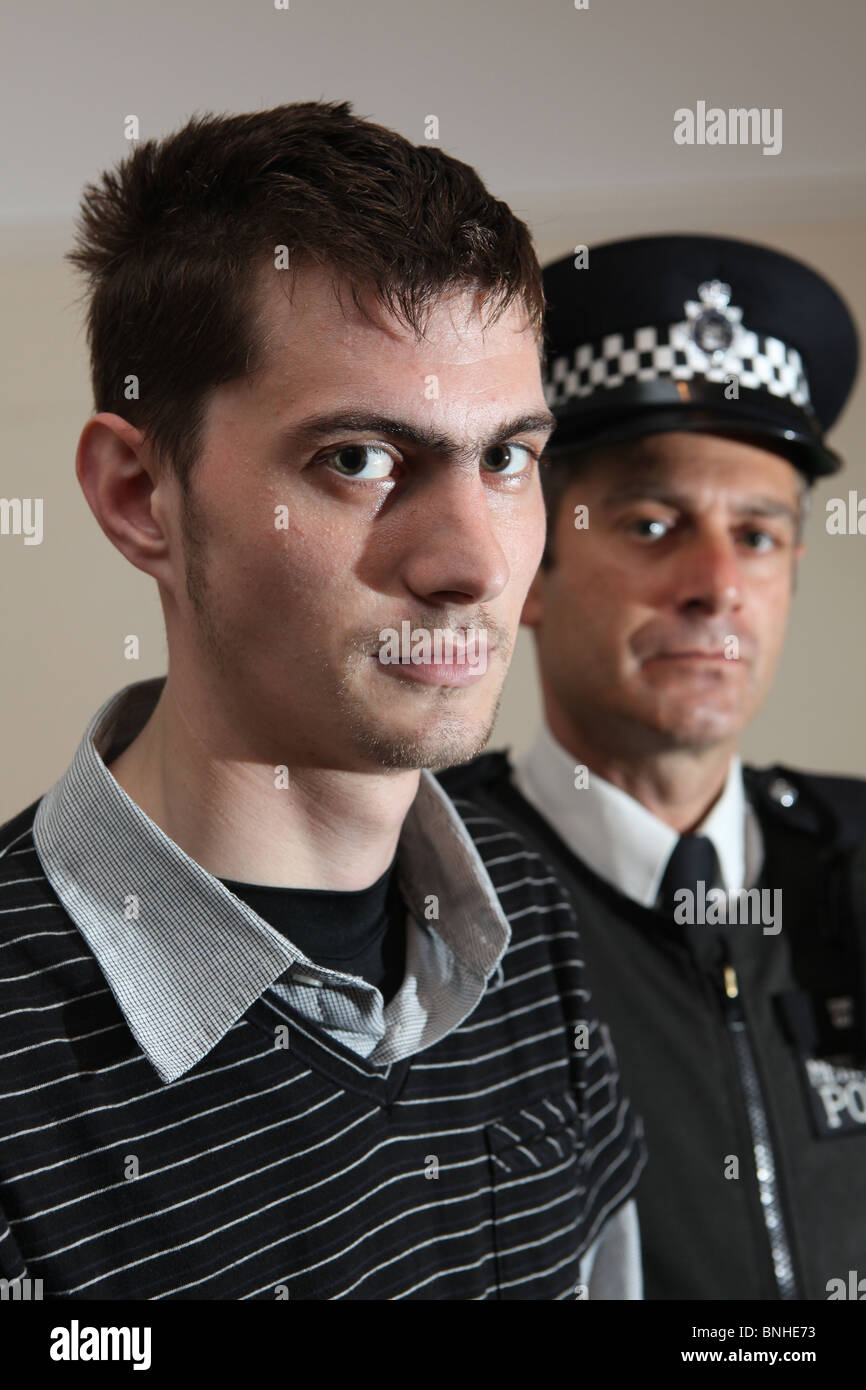 a portrait of a metropolitan police officer with a polish man stood ...