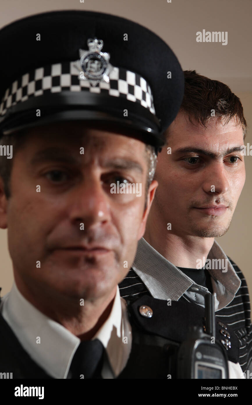 a portrait of a metropolitan police officer with a polish man stood ...