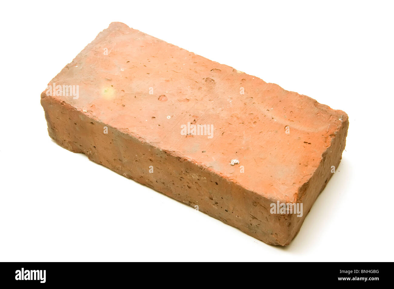 Only a brick Isolated on white background Stock Photo - Alamy