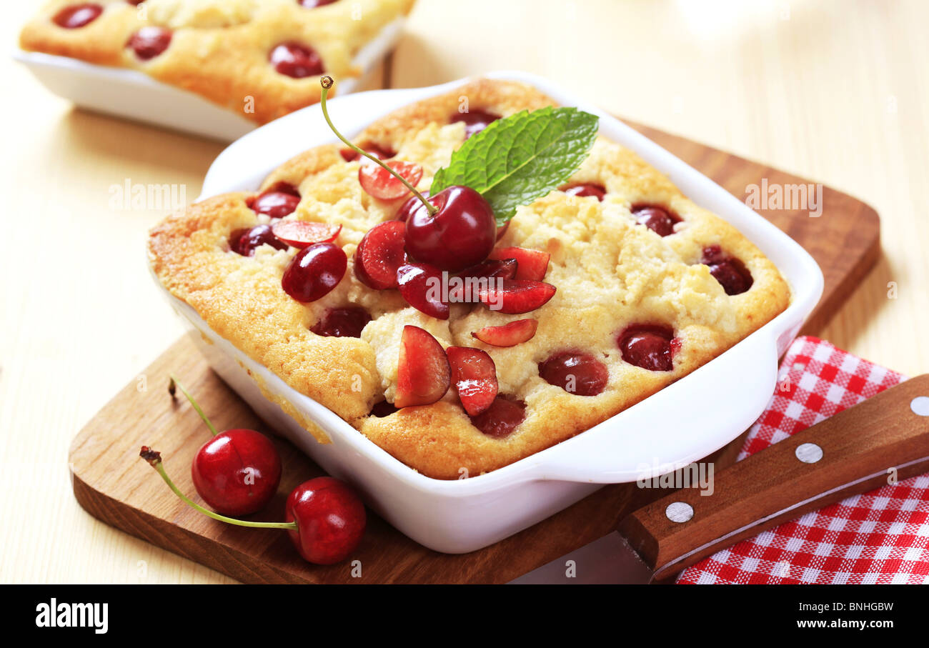 Freshly baked cherry sponge cake Stock Photo - Alamy