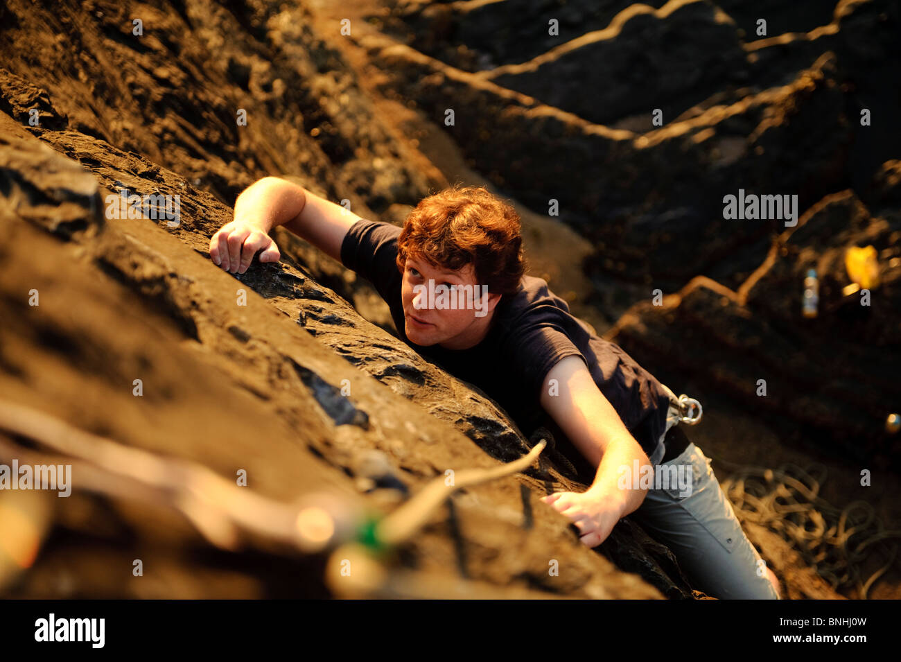 University student climb up wall hi-res stock photography and images ...