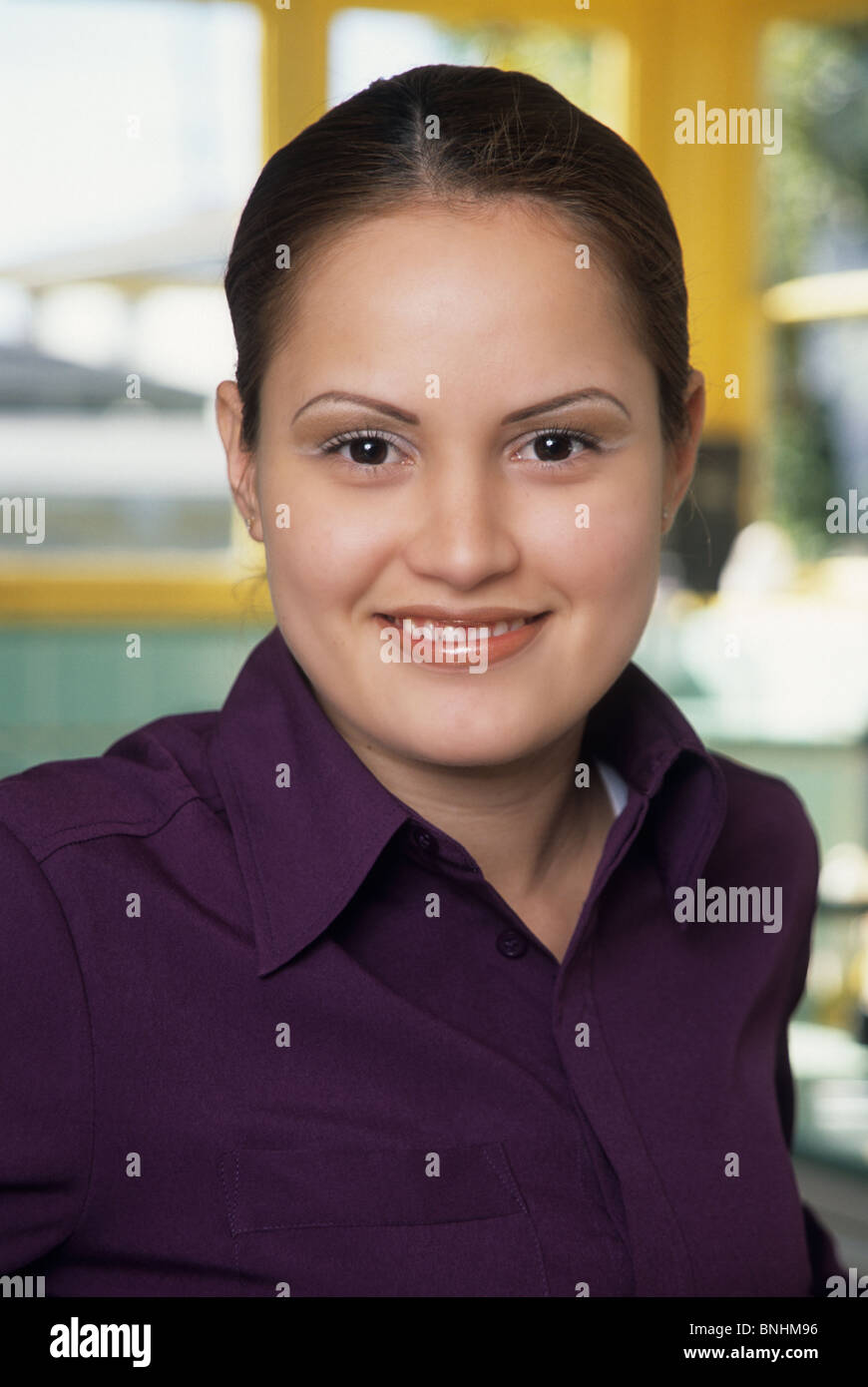 Hispanic woman smiling inside house Stock Photo - Alamy