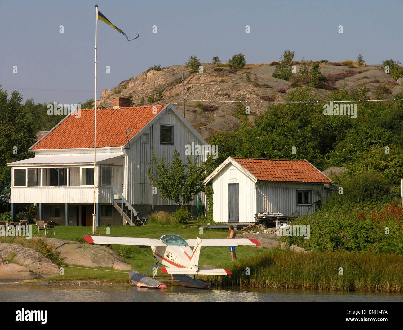 Sweden archipelago coast sea nature house home seaplane floatplane ...
