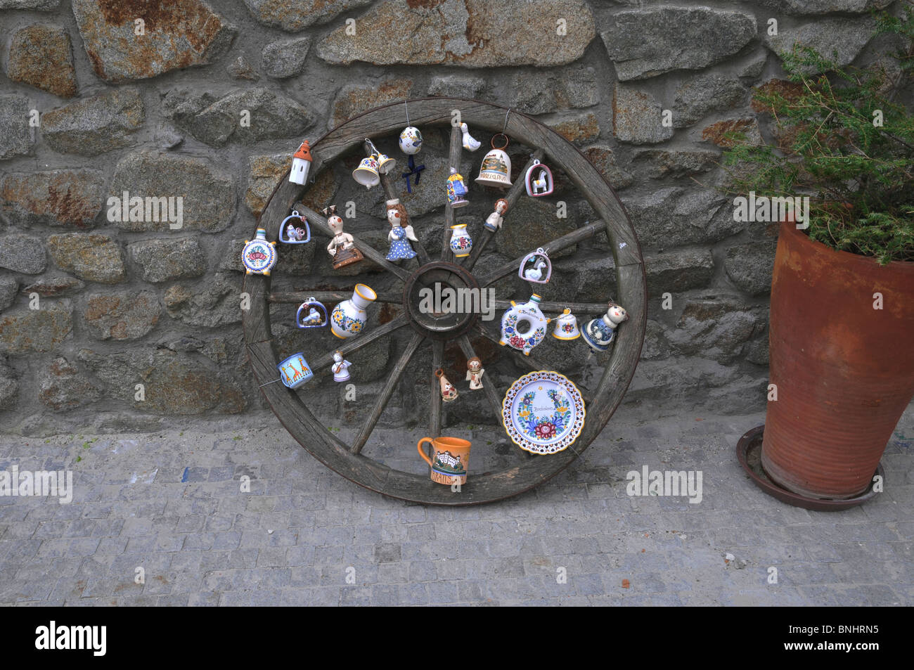 Wooden cartwheel with Slovak souvenirs, Bratislava, Slovak Republic ...