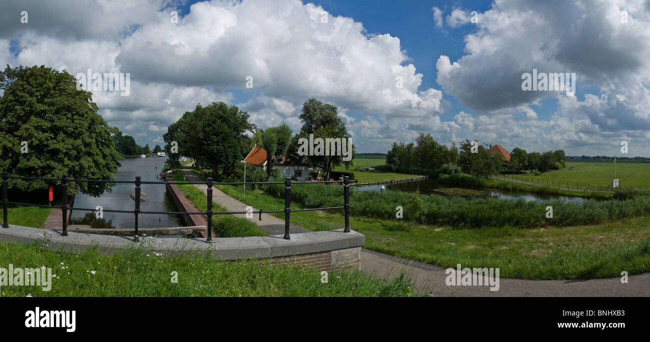 The Netherlands Holland Nauerna sluice lock floodgate fields houses ...