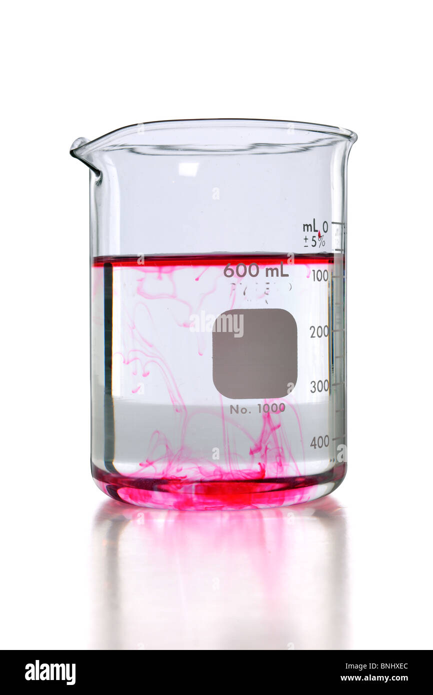 Flask with clear fluid and colorant mixing isolated over white ...