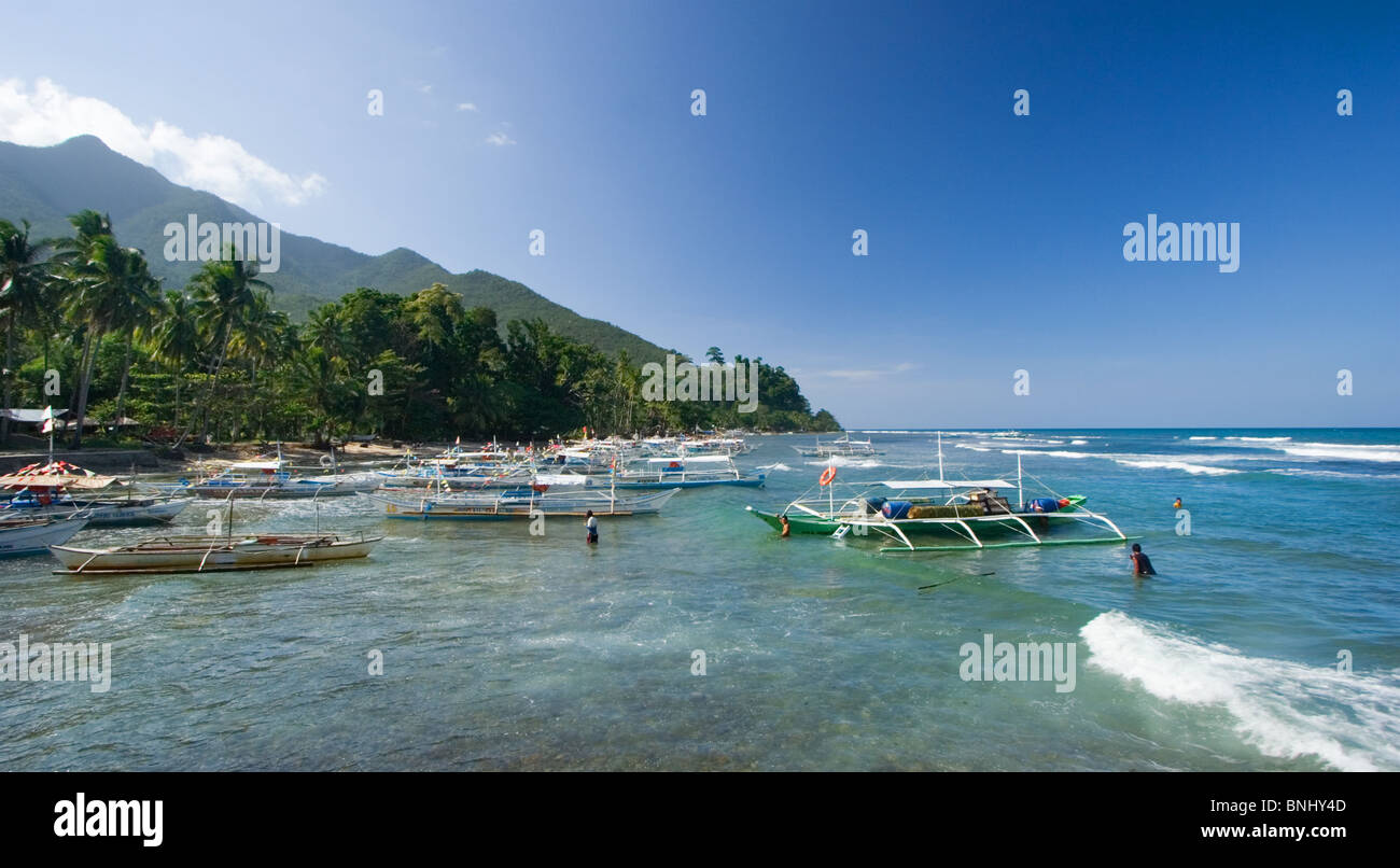 Boats moored in a small bay, Sabang, Palawan, Philippines Stock Photo ...
