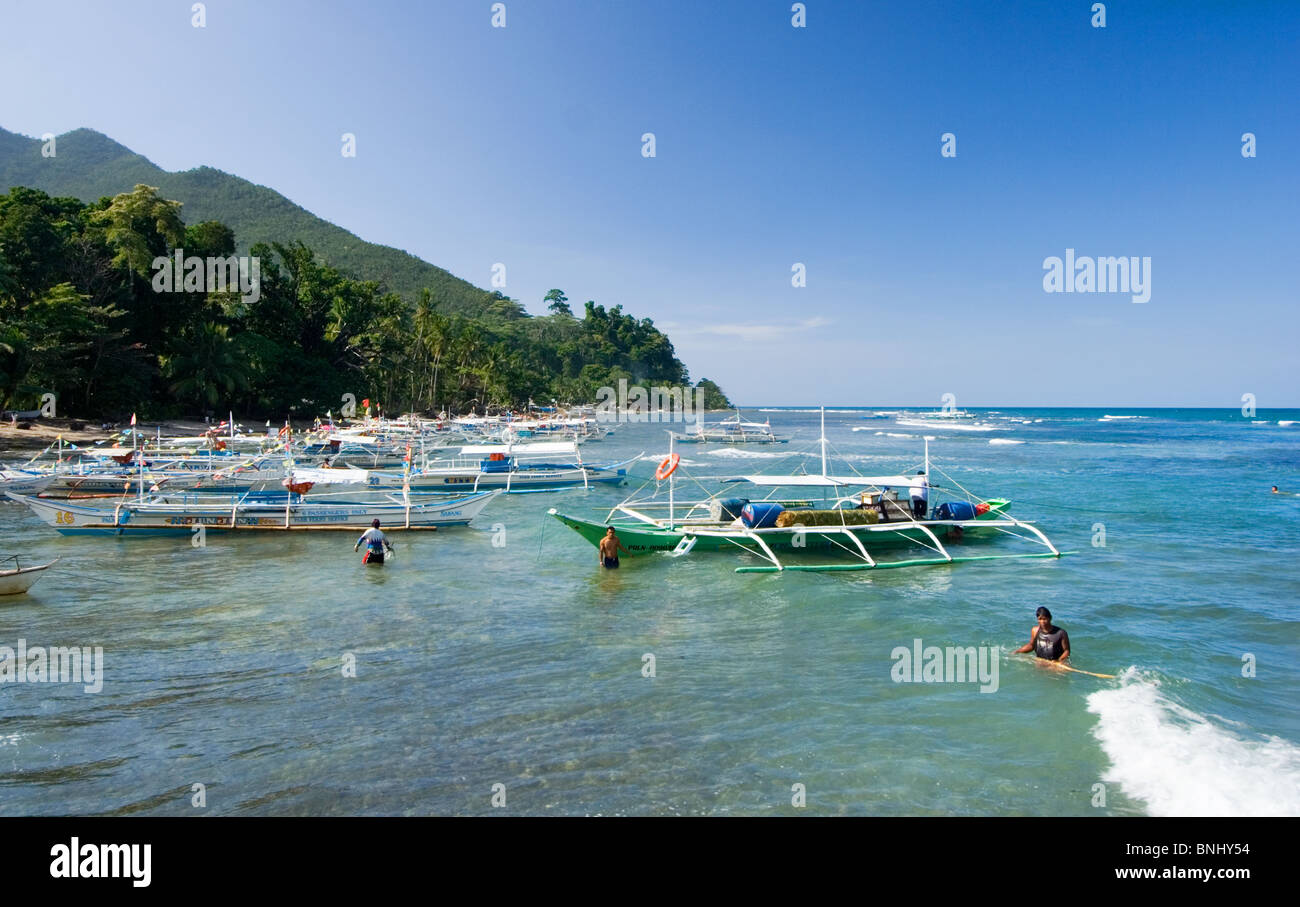 Boats moored in a small bay, Sabang, Palawan, Philippines Stock Photo ...