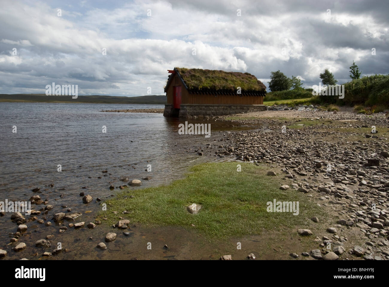 Boathouse, Loch Loyal, Sutherland, Scotland. Traditionally Turf roofed ...