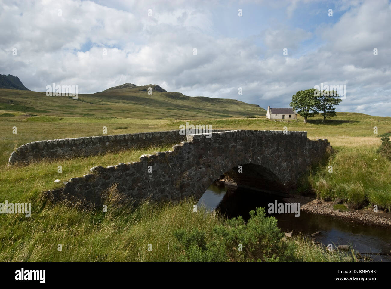 Old Scottish stone bridge over a stream - "burn", traditional old ...