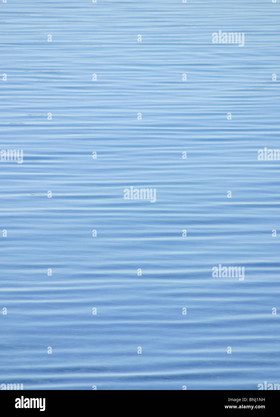 Ripples on calm water Stock Photo - Alamy