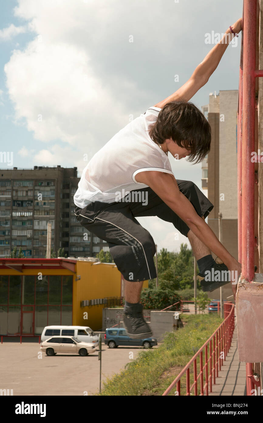 Teenager carries out dangerous exercises Stock Photo - Alamy