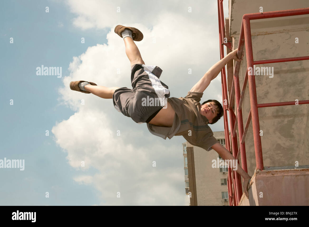 Teenager carries out dangerous exercises Stock Photo - Alamy