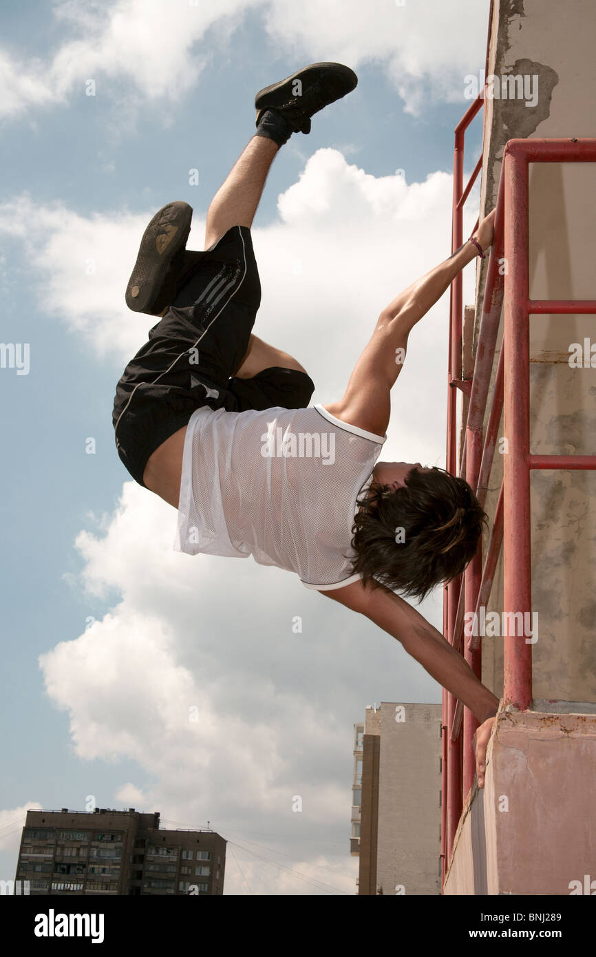 Teenager carries out dangerous exercises Stock Photo - Alamy
