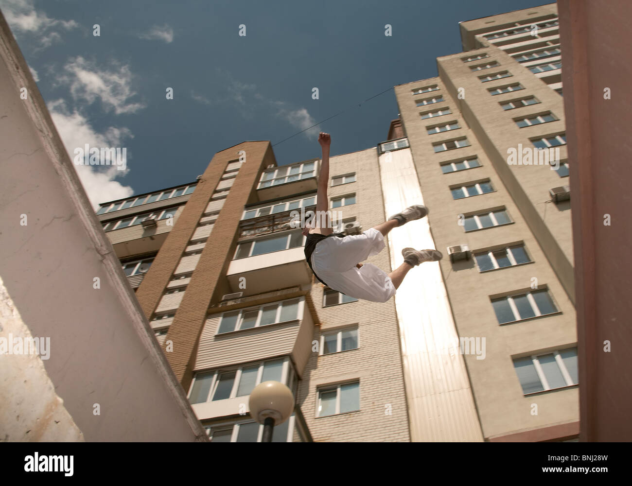 Teenager carries out dangerous exercises Stock Photo - Alamy