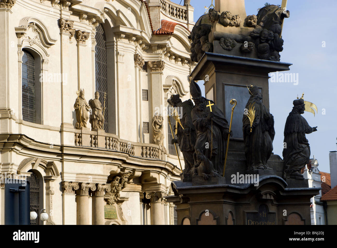 Prague - The baroque column of Holy Trinity and facade of St. Nichlas ...