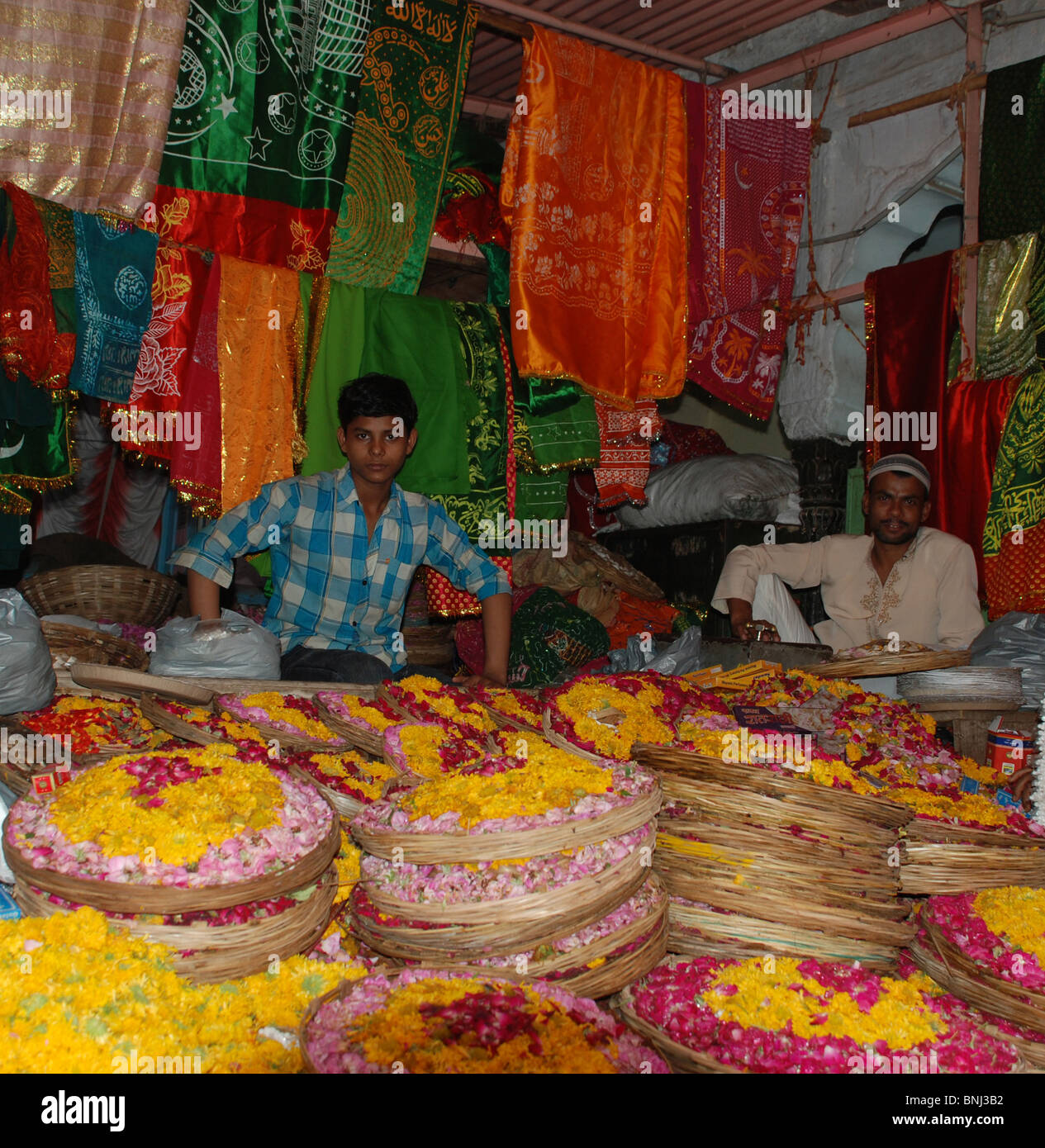 Devotees make offerings of rose, jasmine or place chadar on the tomb ...