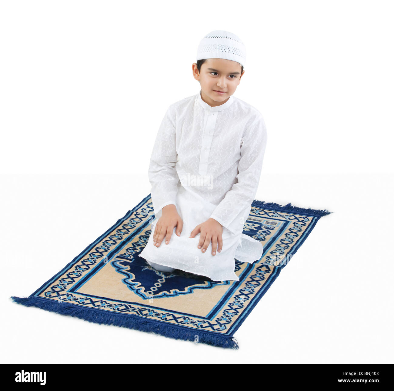 Muslim boy praying Stock Photo - Alamy
