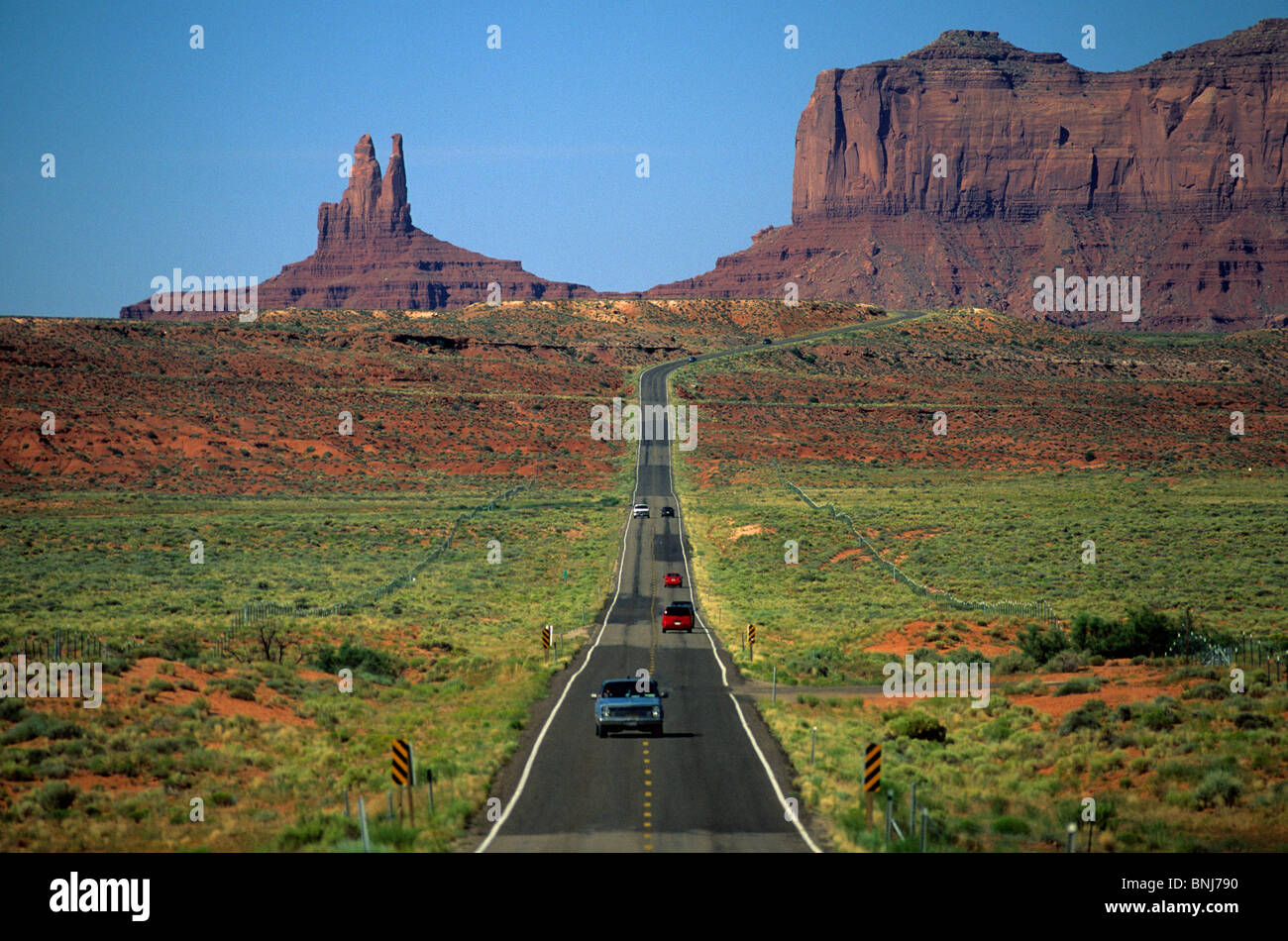 USA Arizona monument Valley road cars automobiles rock towers highway ...