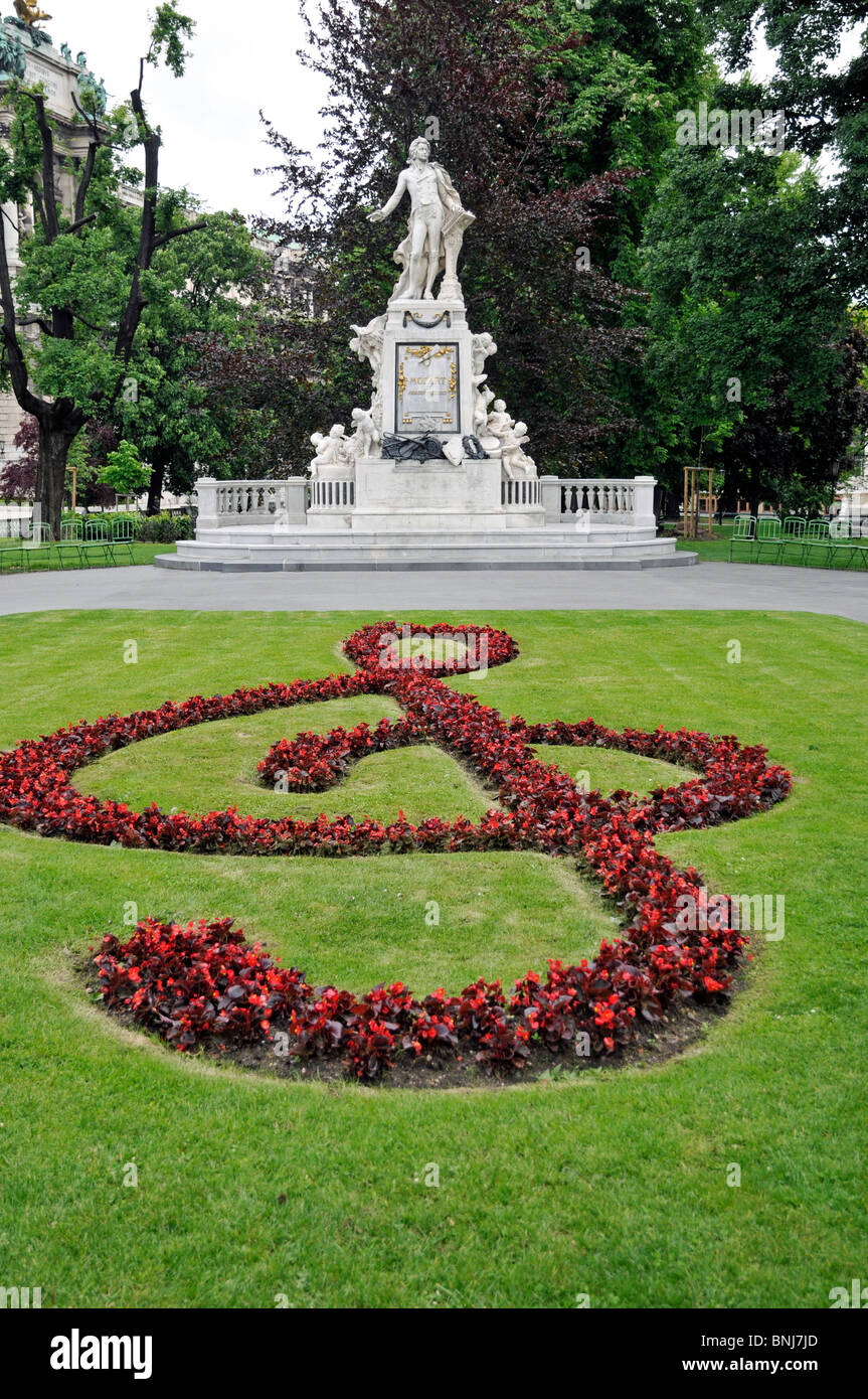 Treble clef from red flowers and Mozart's statue,Vienna,Austria,Europe ...