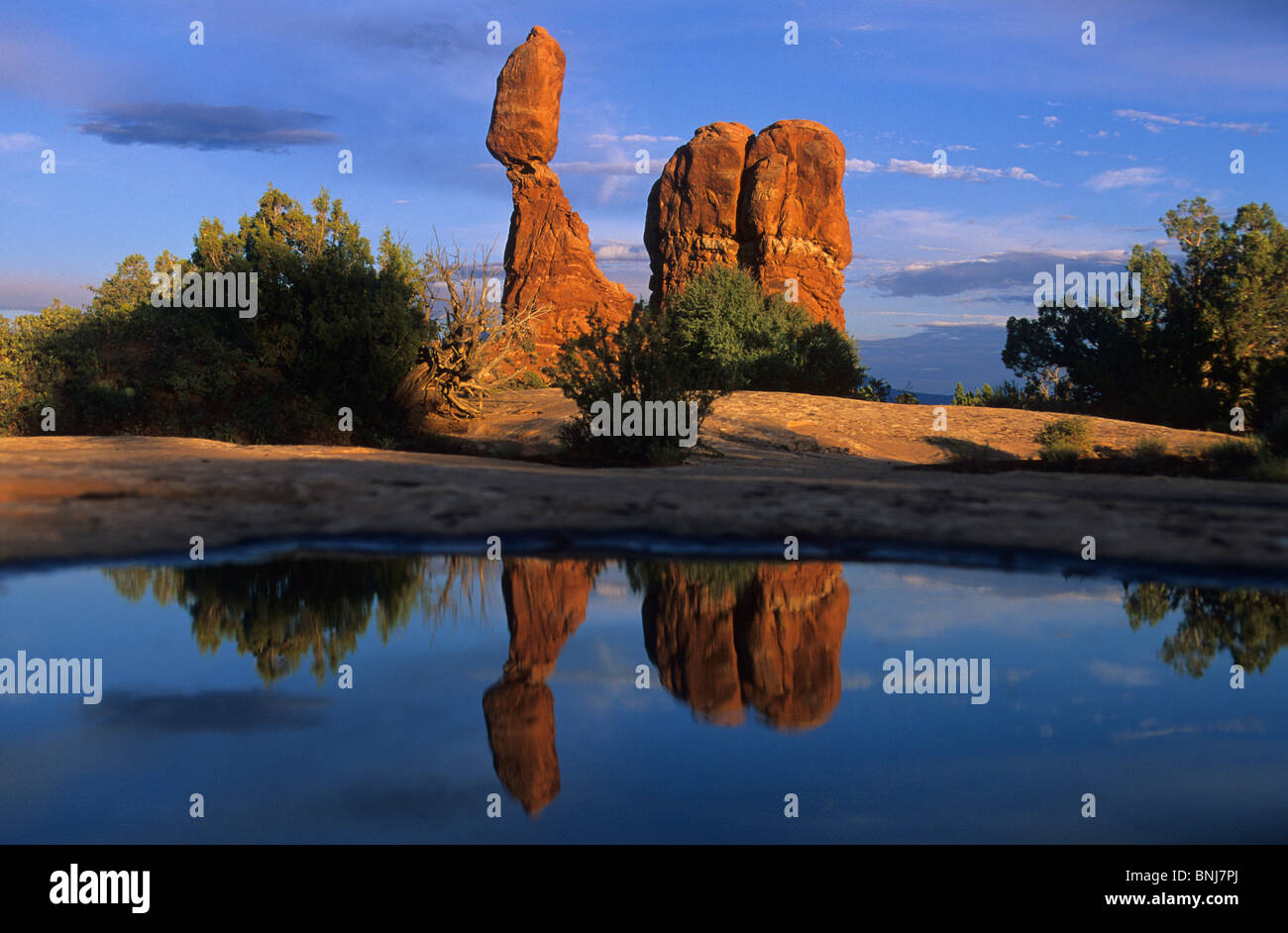 USA Utah national park rock pillar water puddle reflection Arches North ...