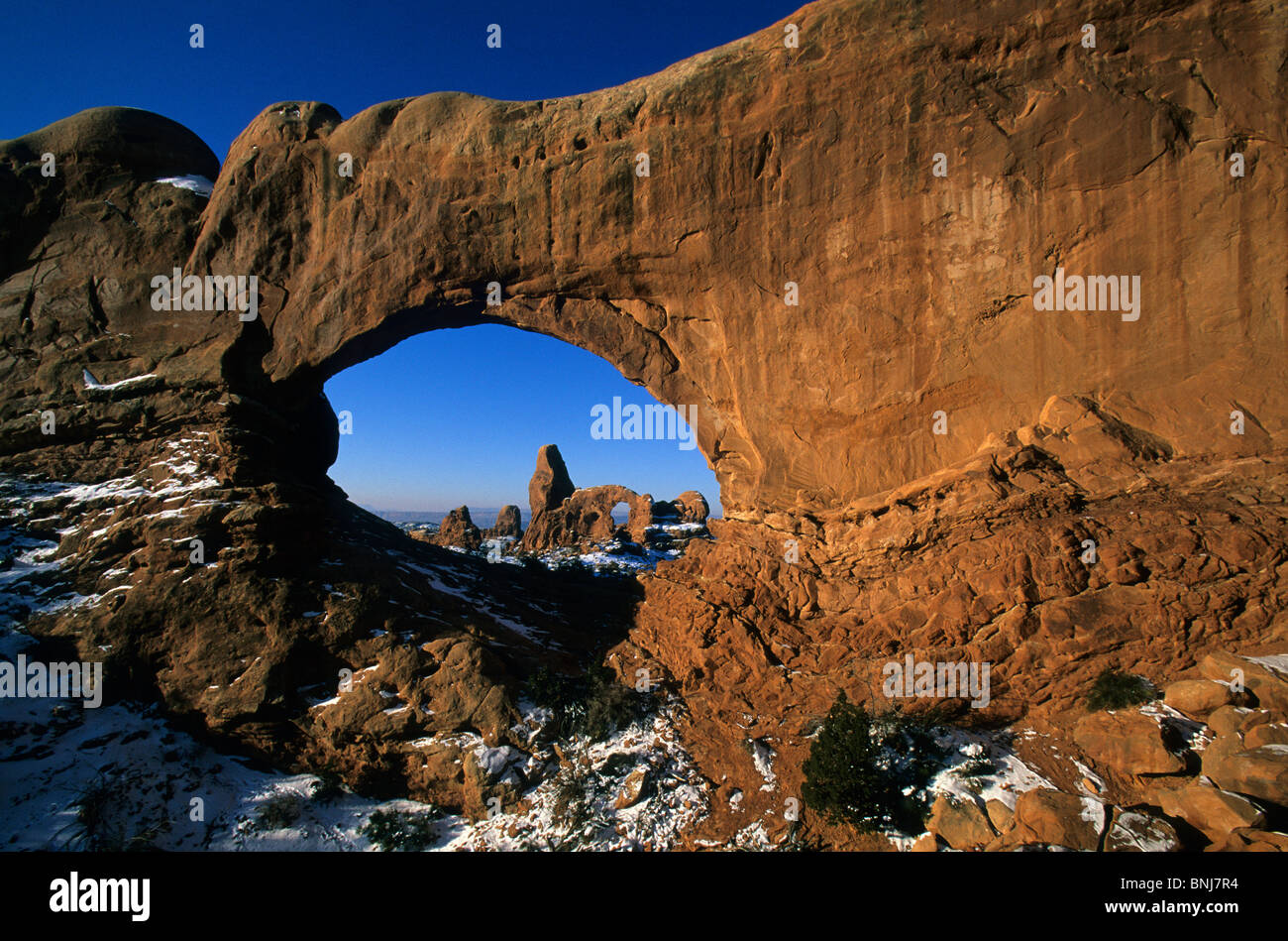 USA Utah national park rock arch natural arch Arch sandstone snow ...