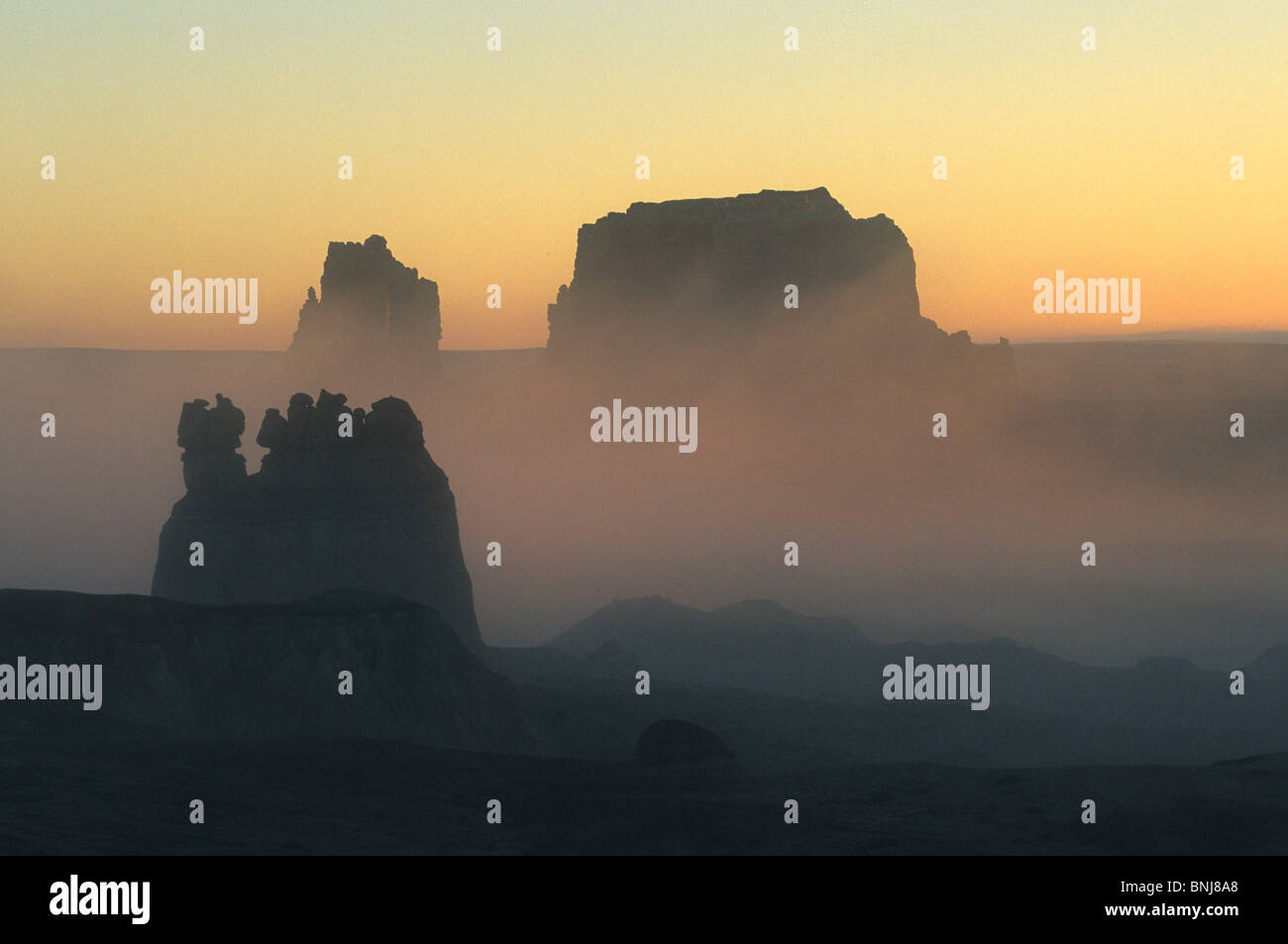 USA Utah rock towers morning light dawn fog Goblin Valley North America ...