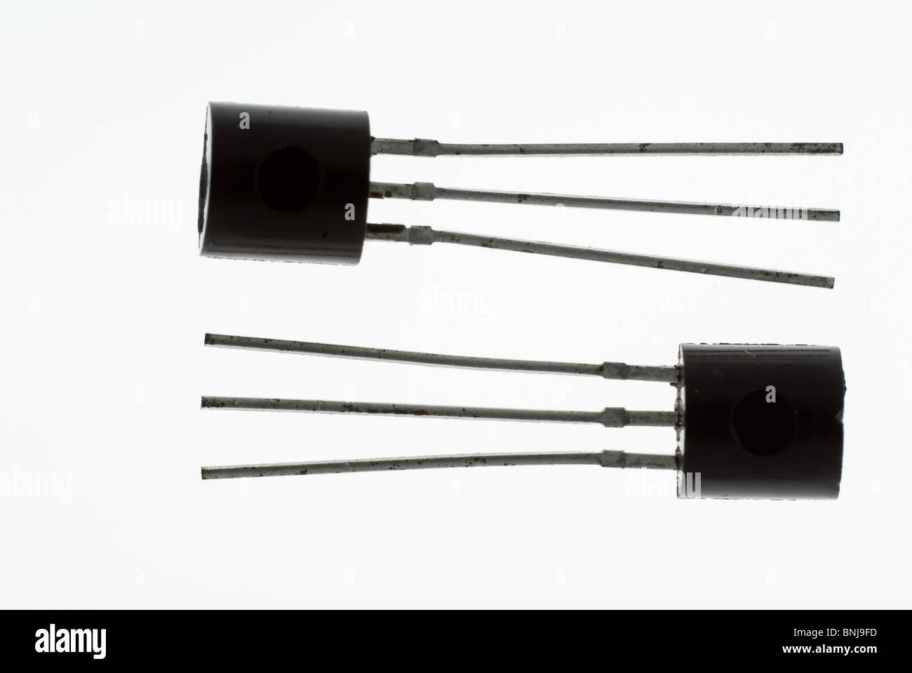 Pair of transistors in black isolated on white Stock Photo - Alamy