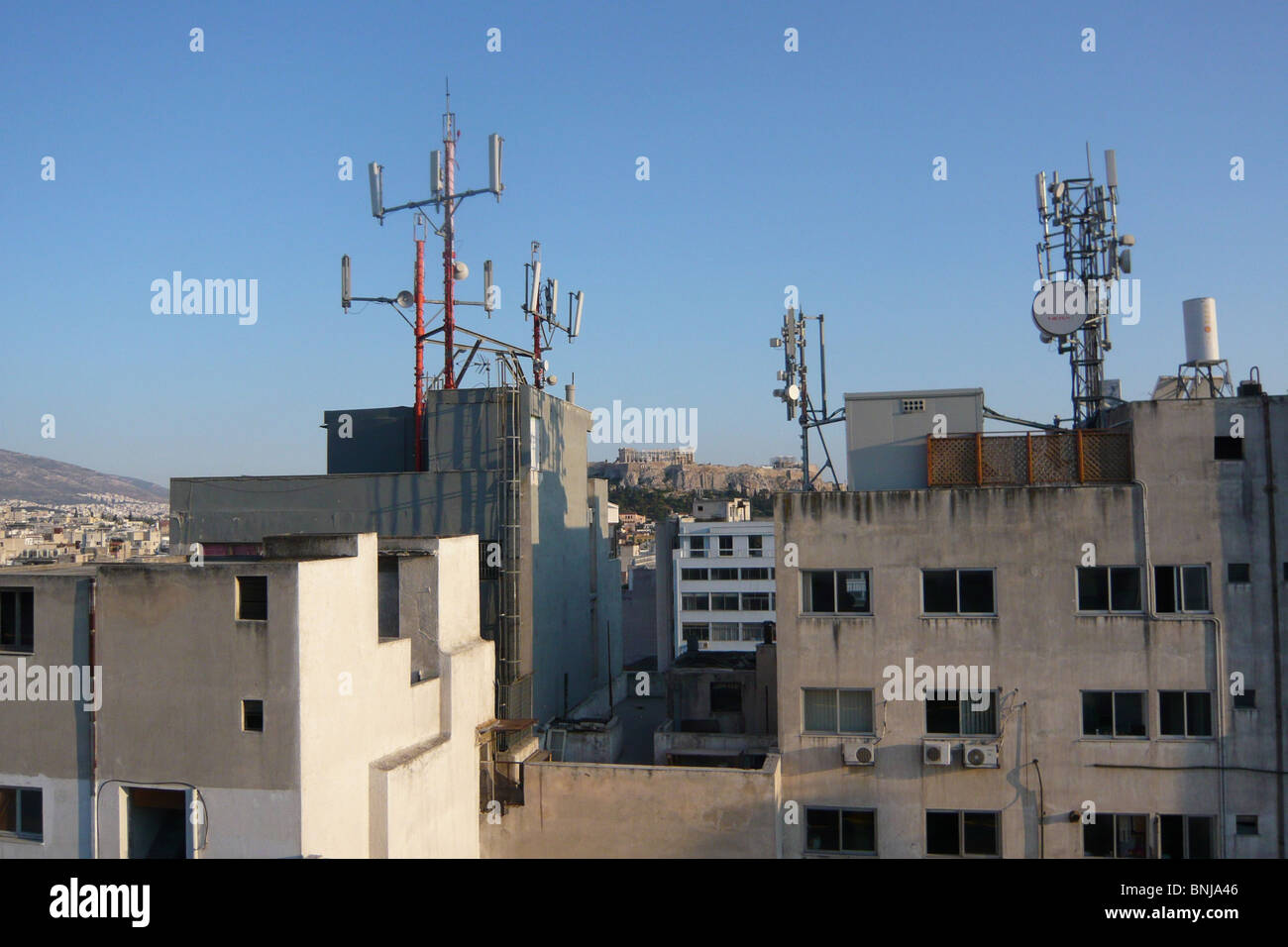 Greece Athens city buildings houses roofs antennas Stock Photo - Alamy