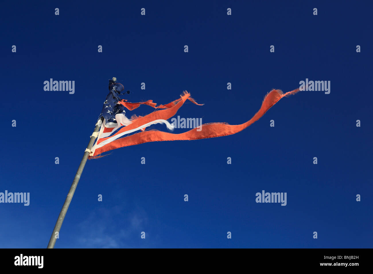 USA Flag Flags Stars and Stripes Weather Stricken Damaged Blue Blue sky ...