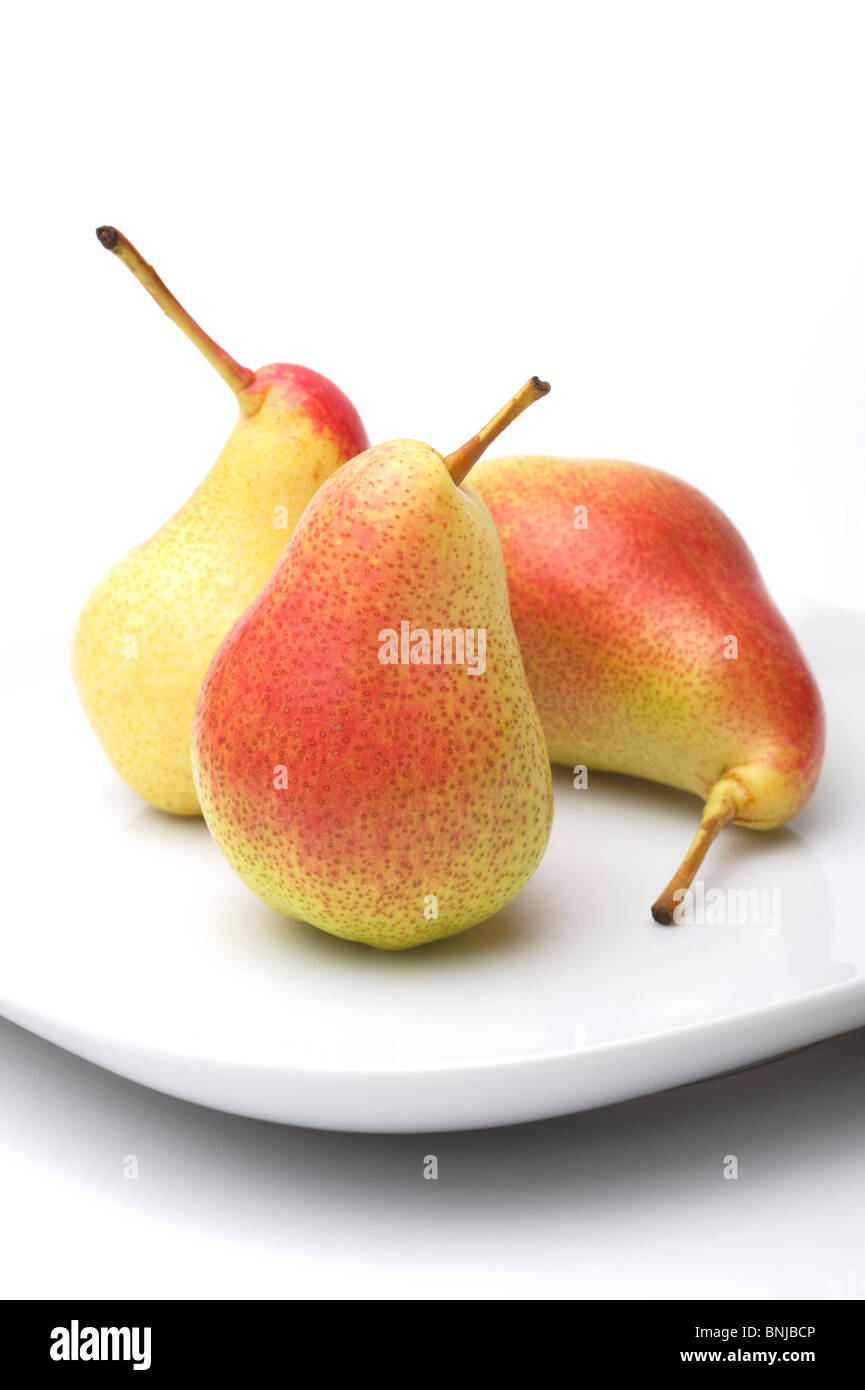 Three pears on a white hi-res stock photography and images - Alamy