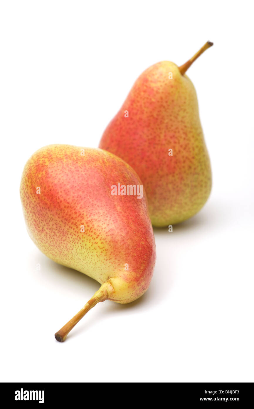 Two ripe yellow-red pears on a white background Stock Photo - Alamy