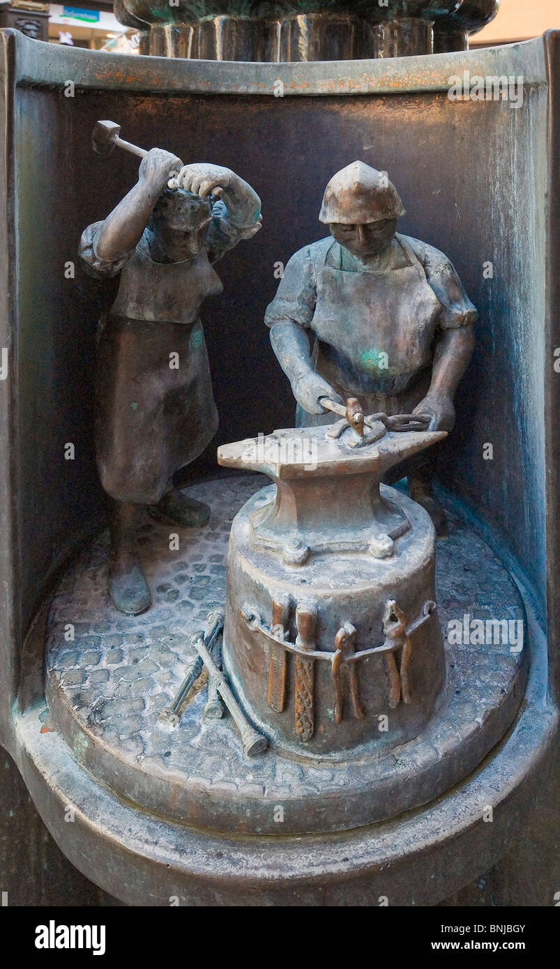 Germany Baden-Wurttemberg Reutlingen Zunftbrunnen figures smith patina ...