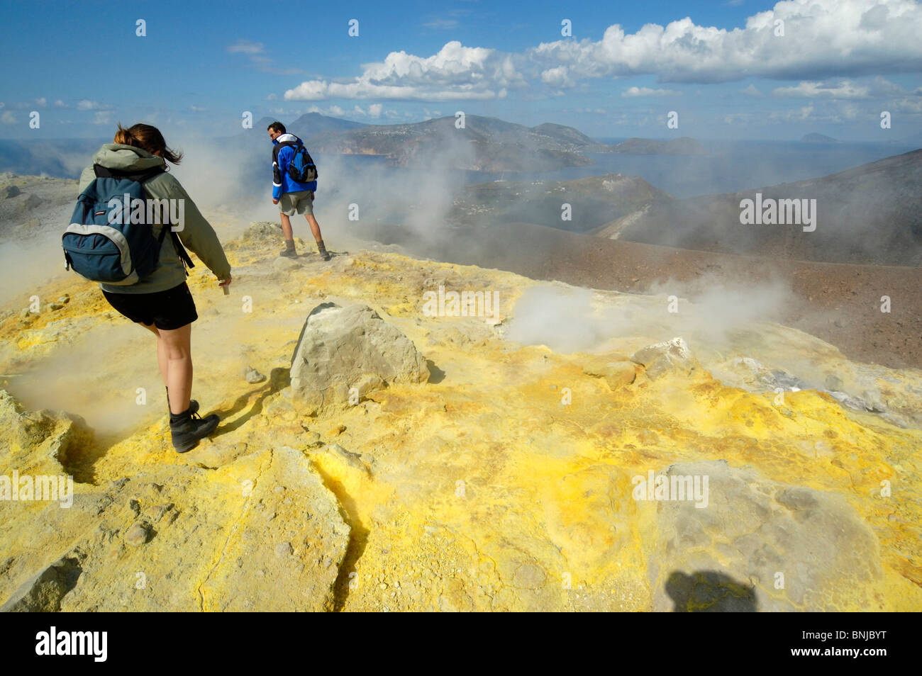 Volcano steams vapors steam sulphur sulfur yellow Italy island isle ...