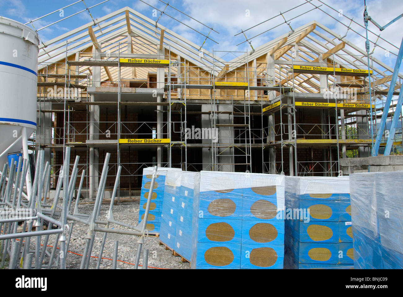 House Home building site new building build crane roof shell position ...