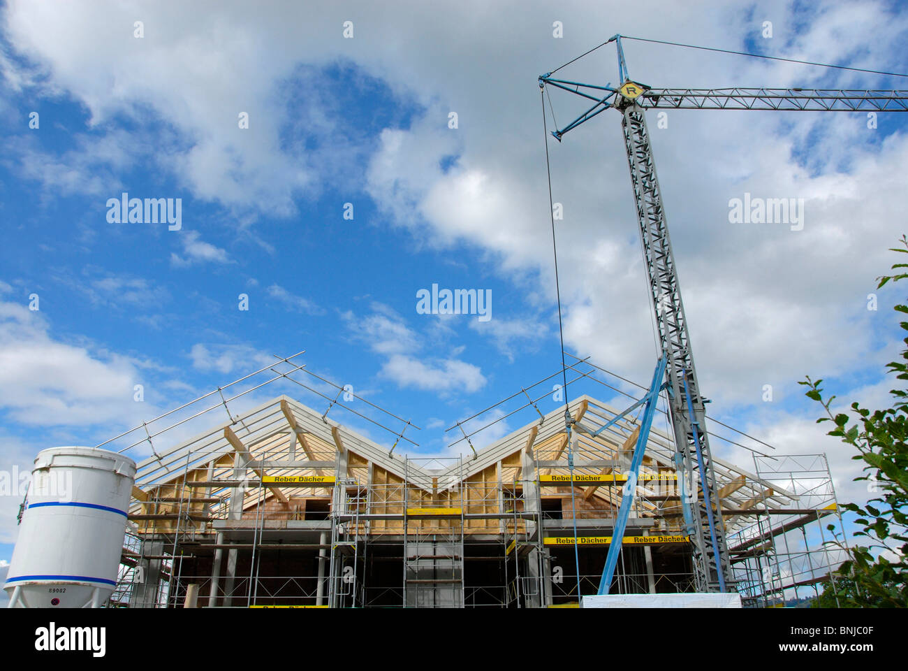 House Home building site new building build crane roof shell position ...