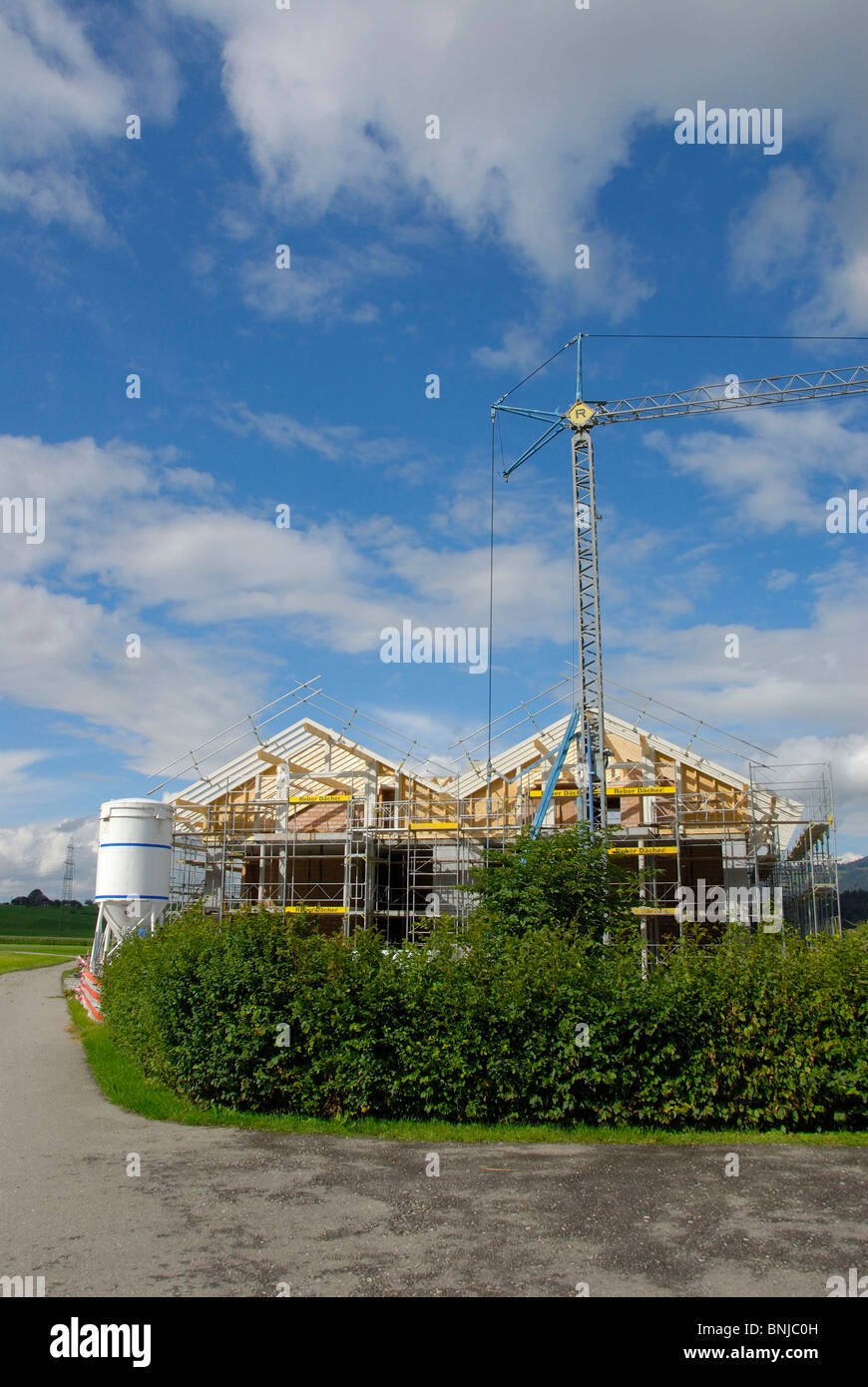House Home building site new building build crane roof shell position ...