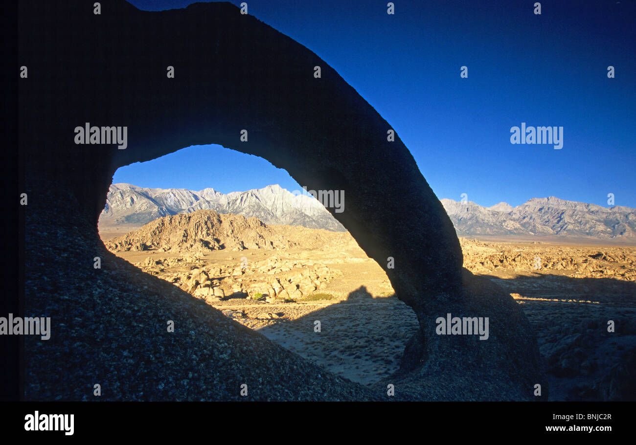 USA California stone arc natural arch rock cliff rock mountains morning ...