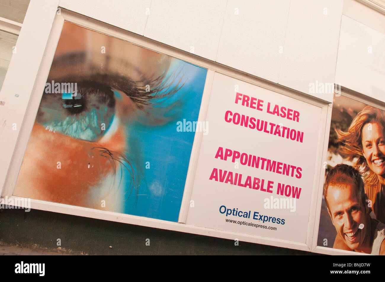 A sign advertising Free laser consultation for eyes at Optical Express ...