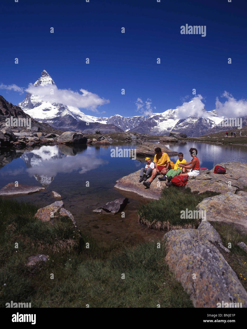 alps alpine mountain mountains lake group children Family Hiking ...