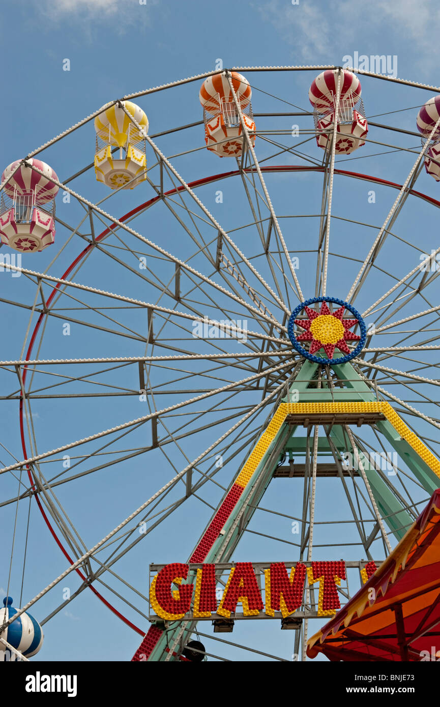 GIANT ferris wheel ride at Skegness fairground Stock Photo - Alamy