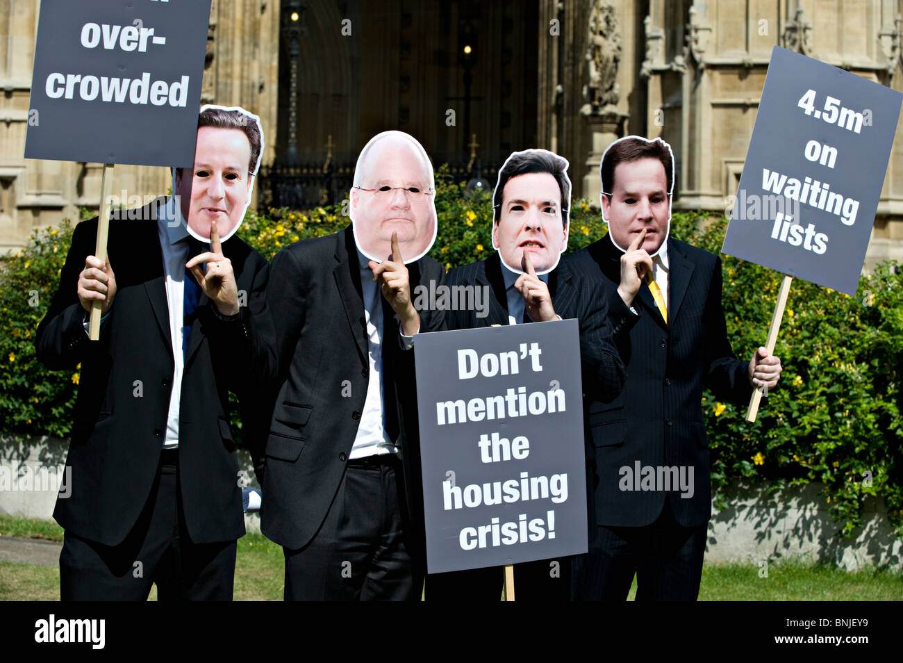 Masked protesters outside British Parliament at Westminster, London, UK ...
