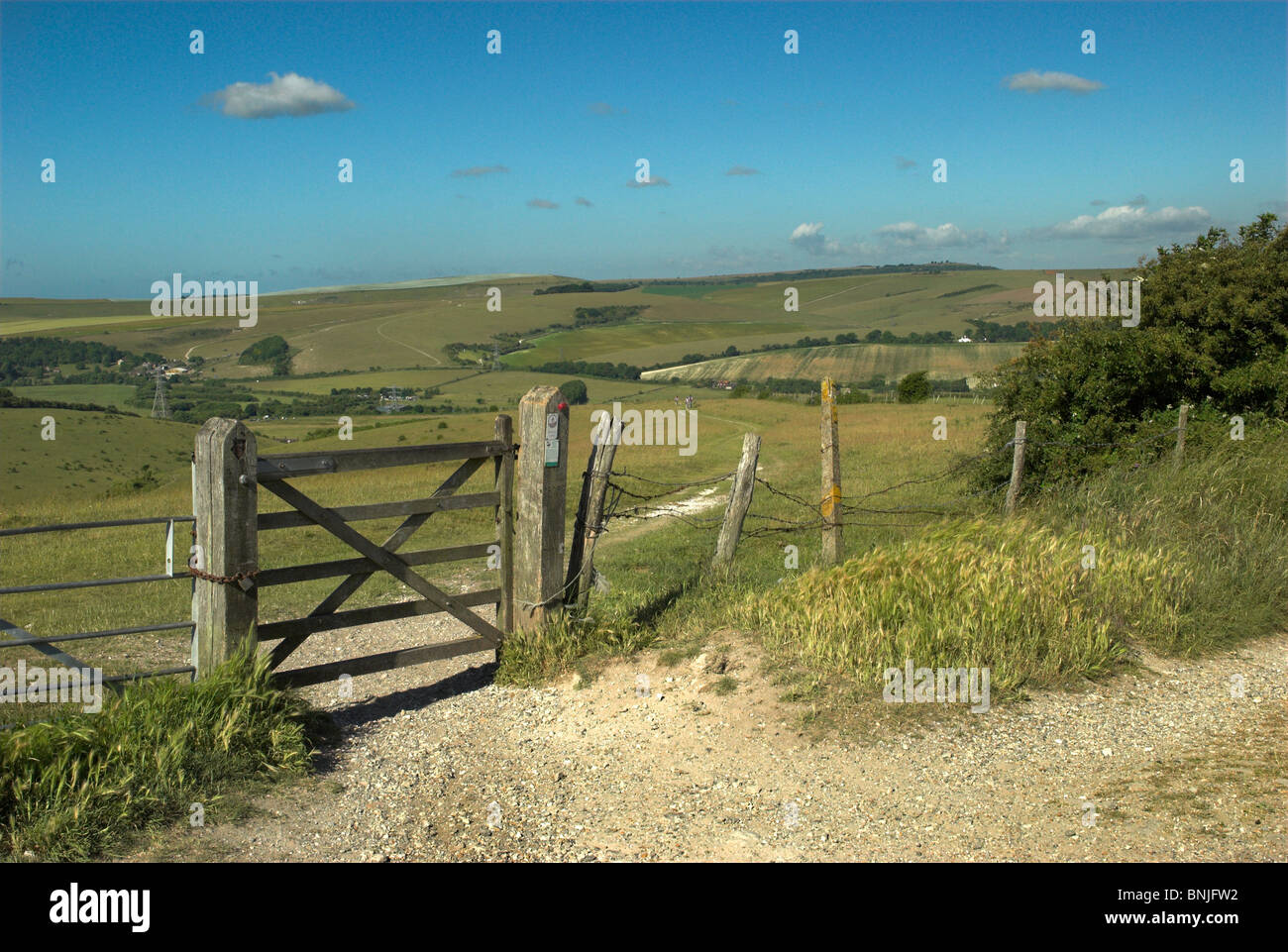 A gate to the South Downs Way leading down Beeding Hill to the River ...