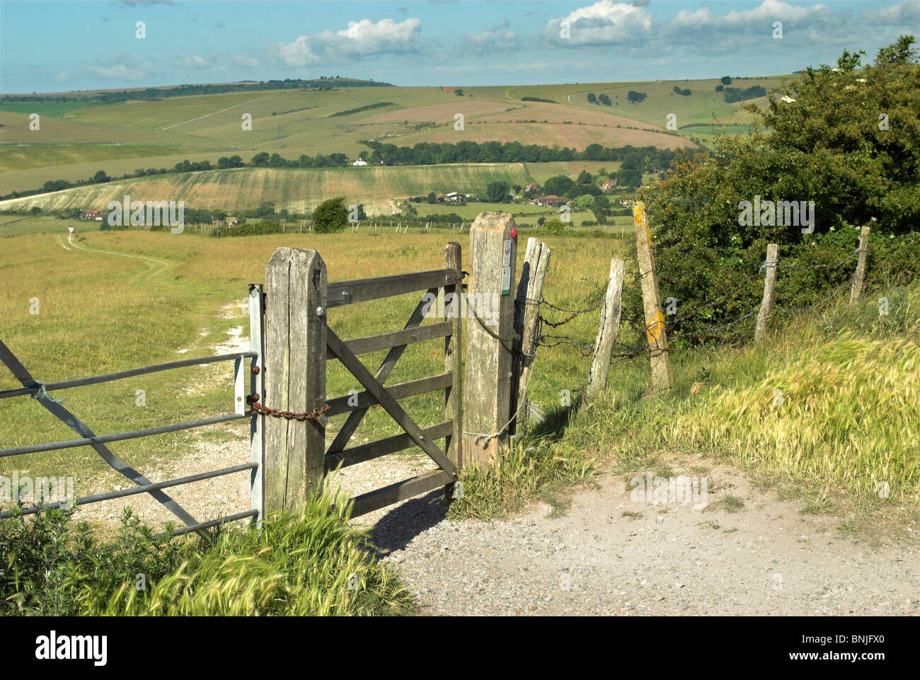 A gate to the South Downs Way leading down Beeding Hill to the River ...